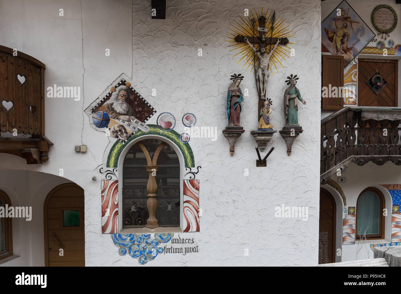 Jesus crucifix on house wall hi-res stock photography and images - Alamy