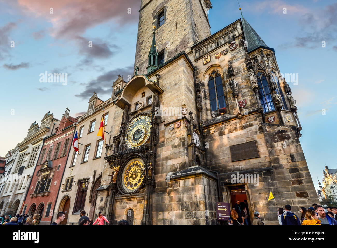 Tourists visit the medieval Astronomical Clock in Old Town Square in ...