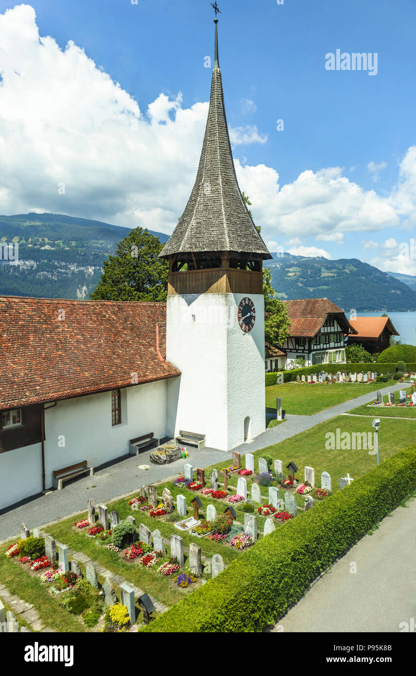 View of the tower and clock of the small local Leissigen Church in the ...