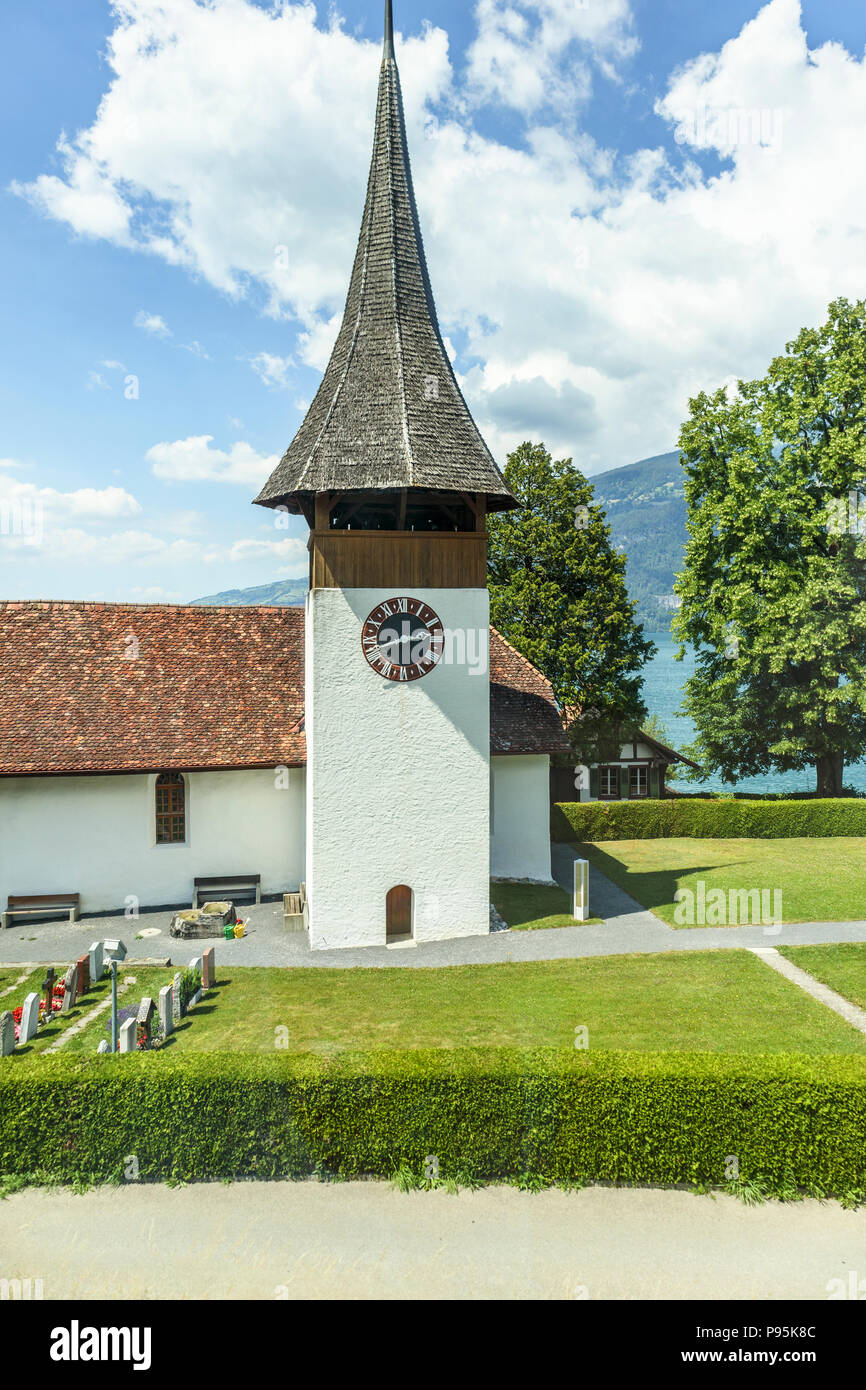 View of the tower and clock of the small local Leissigen Church in the ...