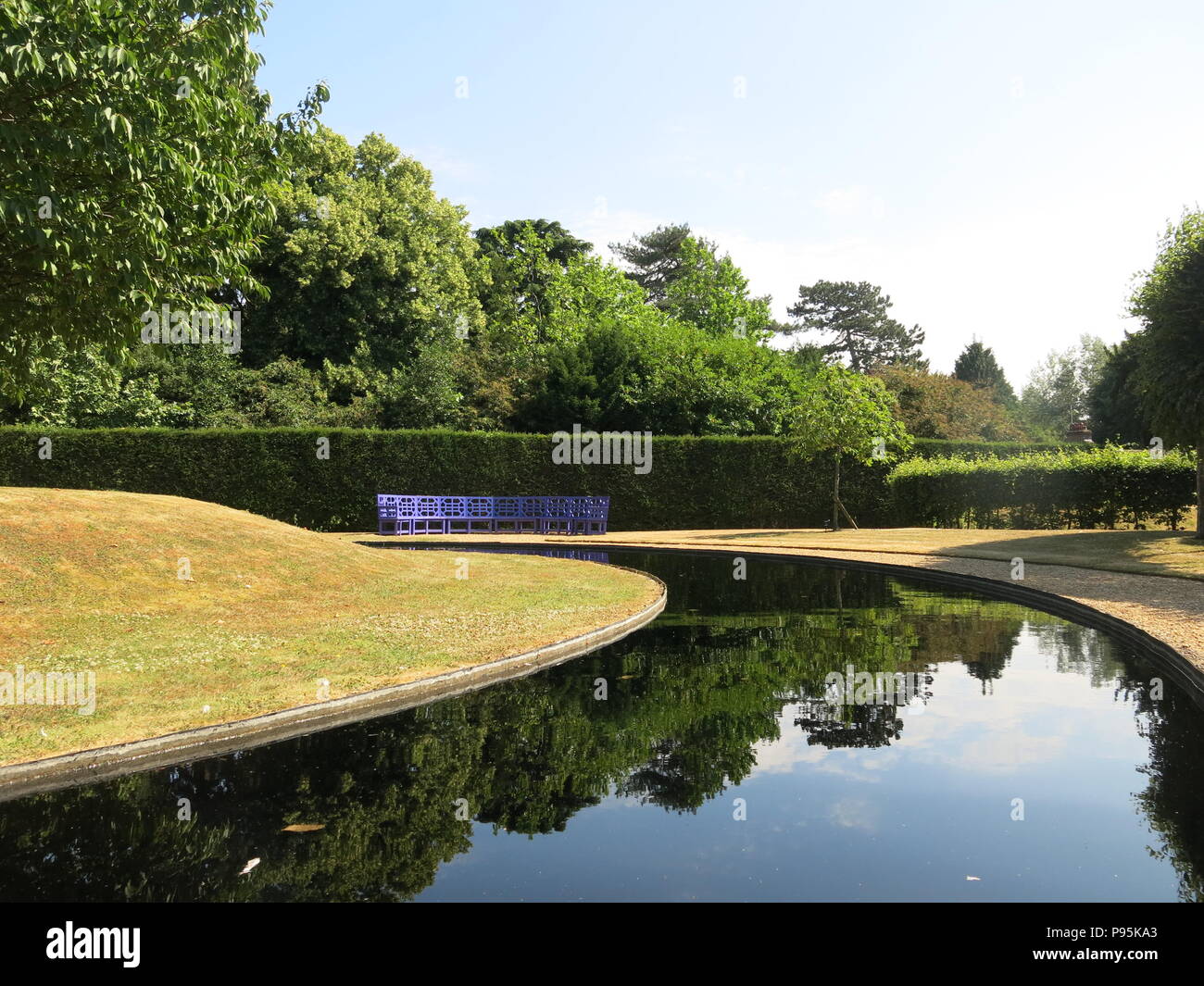 The contemporary Lynn Garden with gently flowing water channels round ...