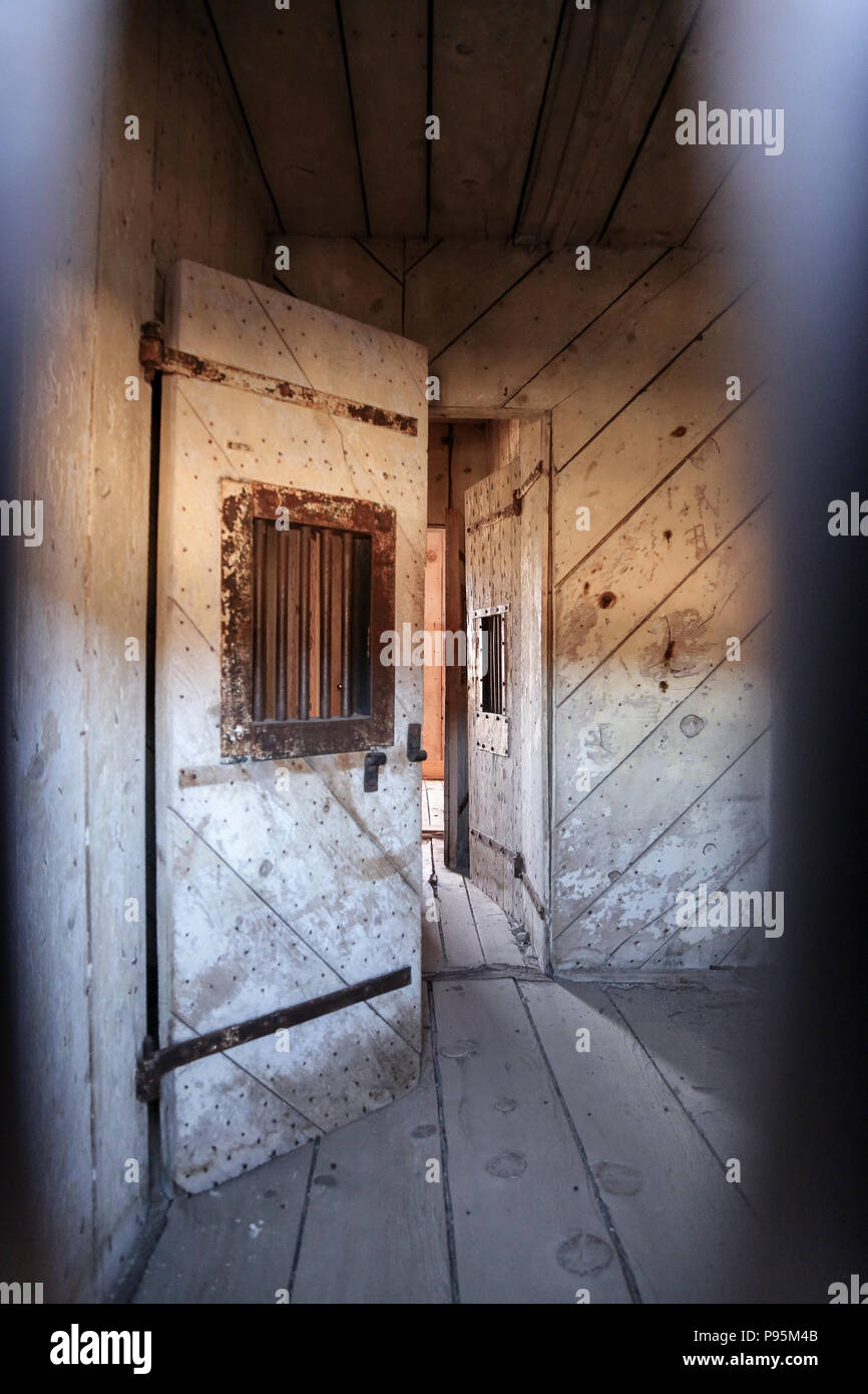 Looking inside a jailhouse window in the abandoned Old West town of ...