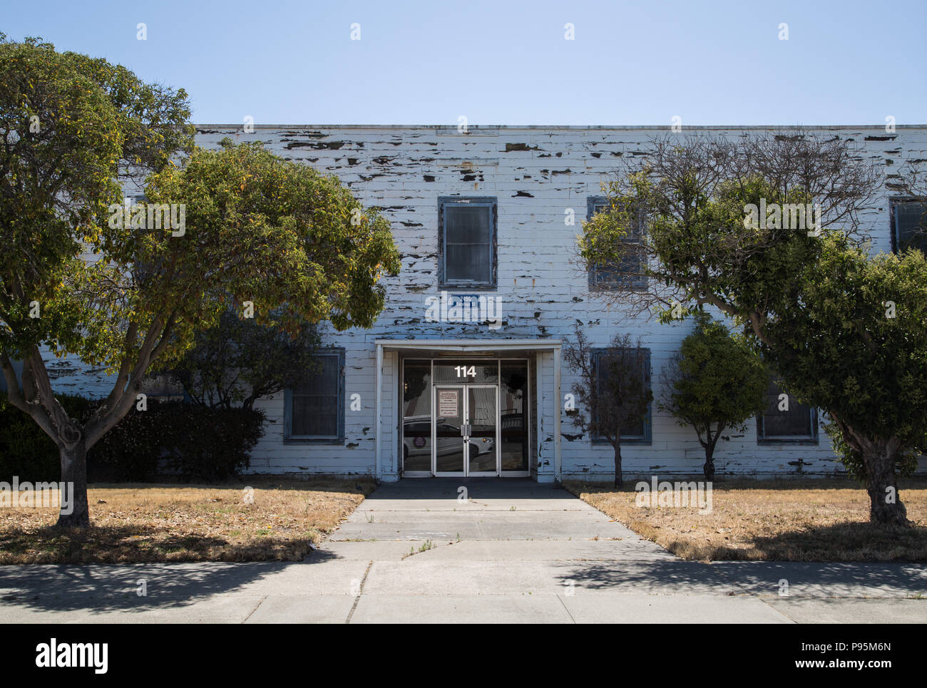 The entrance to an abandoned building at Naval Air Station in Alameda ...