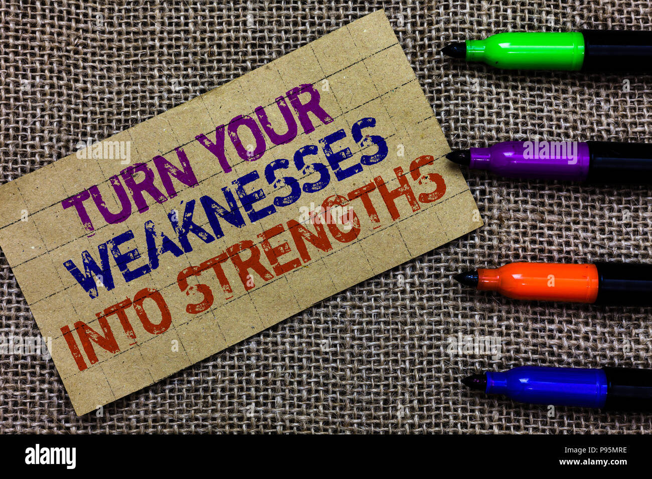 Handwriting text writing Turn Your Weaknesses Into Strengths. Concept ...