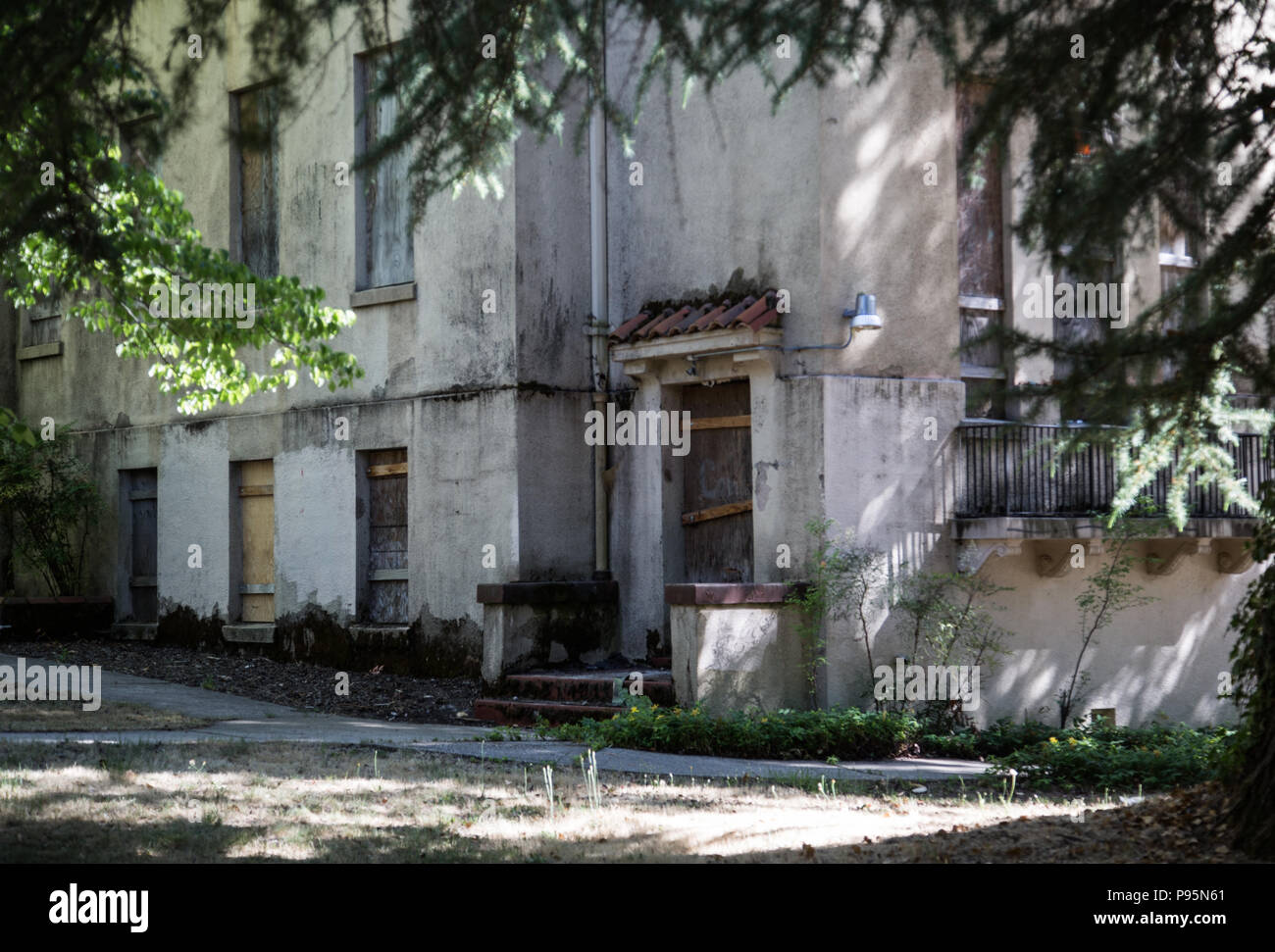 The side of one of the abandoned buildings, the Hew Building, of Nevada ...