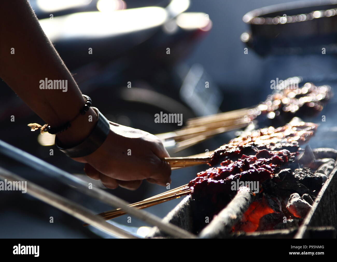 How to burn satay Stock Photo - Alamy