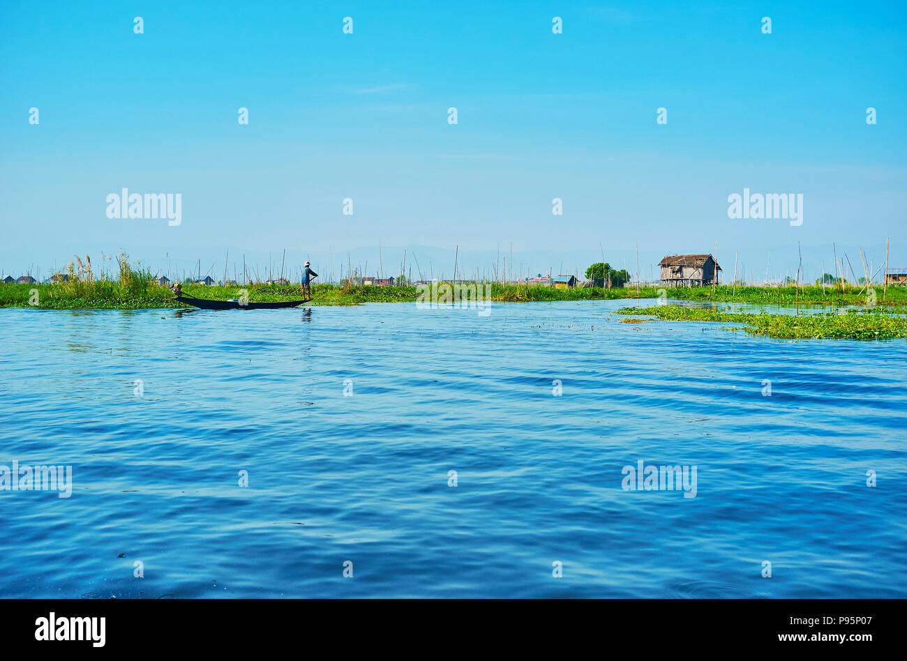 Expance of Inle Lake with a view on floating farms and stilt houses of ...