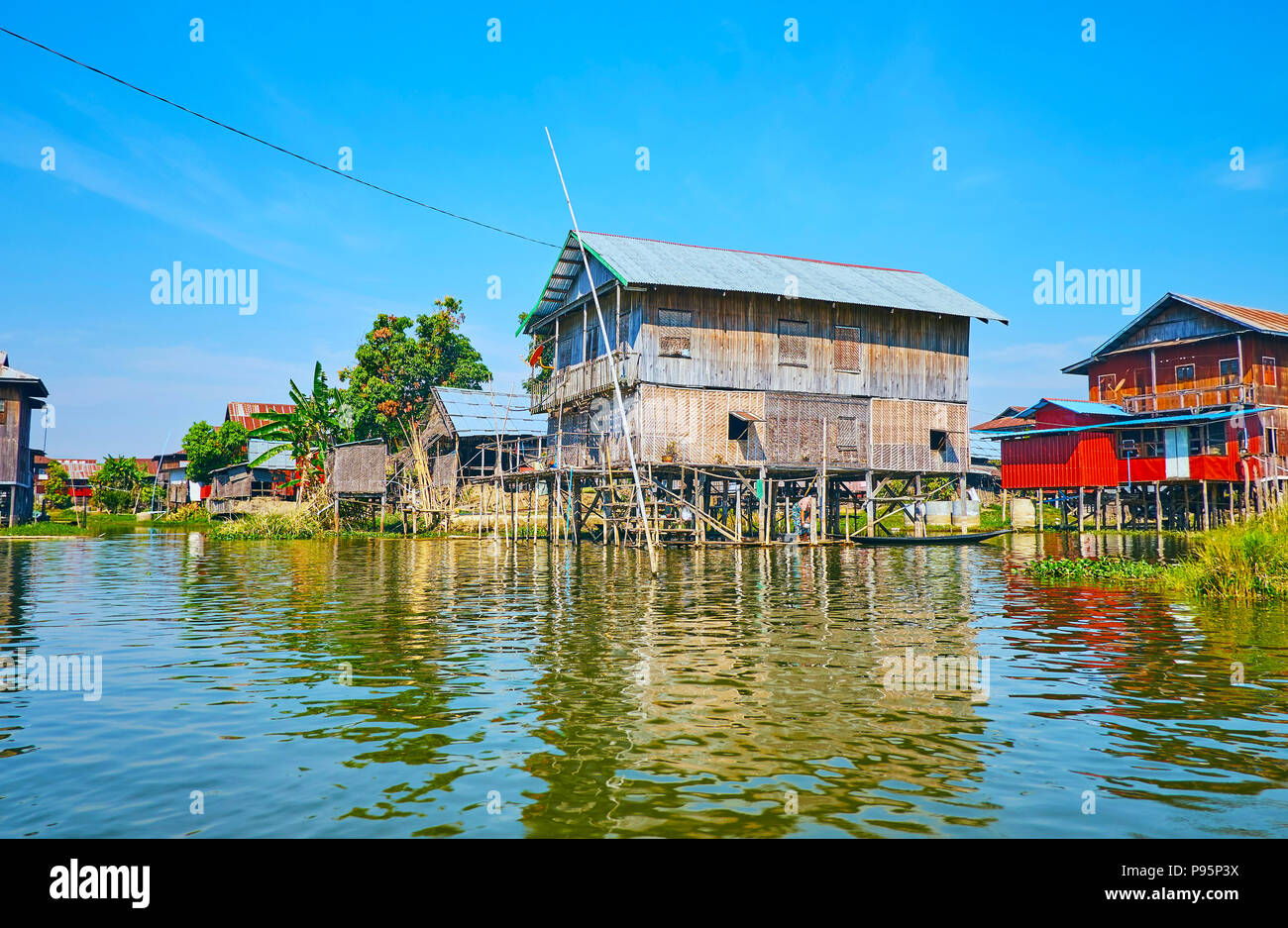 Inle Lake boasts numerous water villages with scenic stilt houses ...