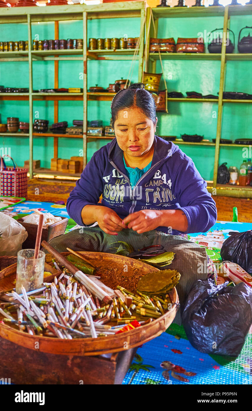 YWAMA, MYANMAR - FEBRUARY 18, 2018: Burmese woman works in cigarette ...