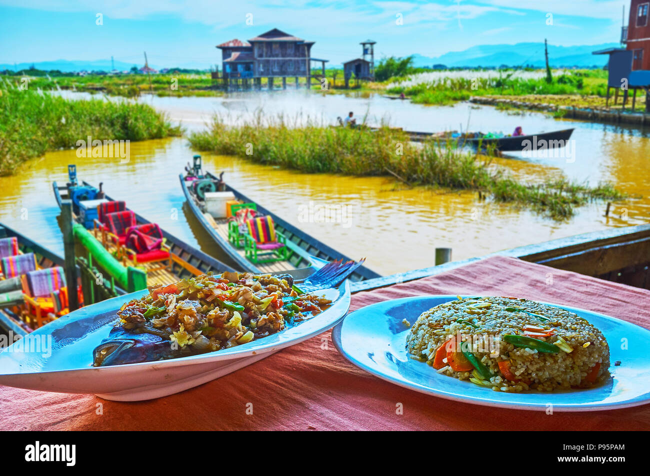 The lake fish with sauce and spicy vegetables and Burmese rice in ...