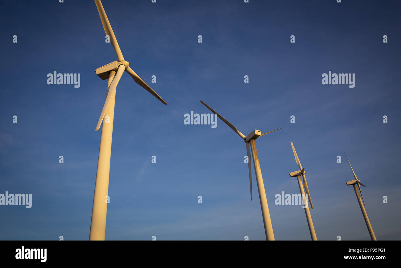 A Row of Wind Turbines Stock Photo - Alamy