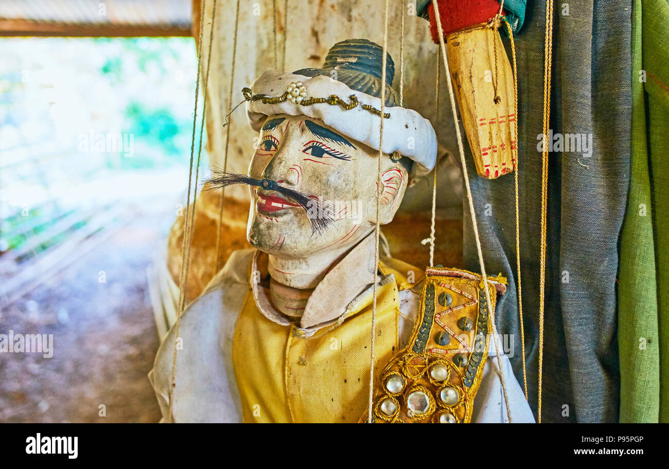 The close-up of traditional smiling marionette in authentic attire, Inn ...