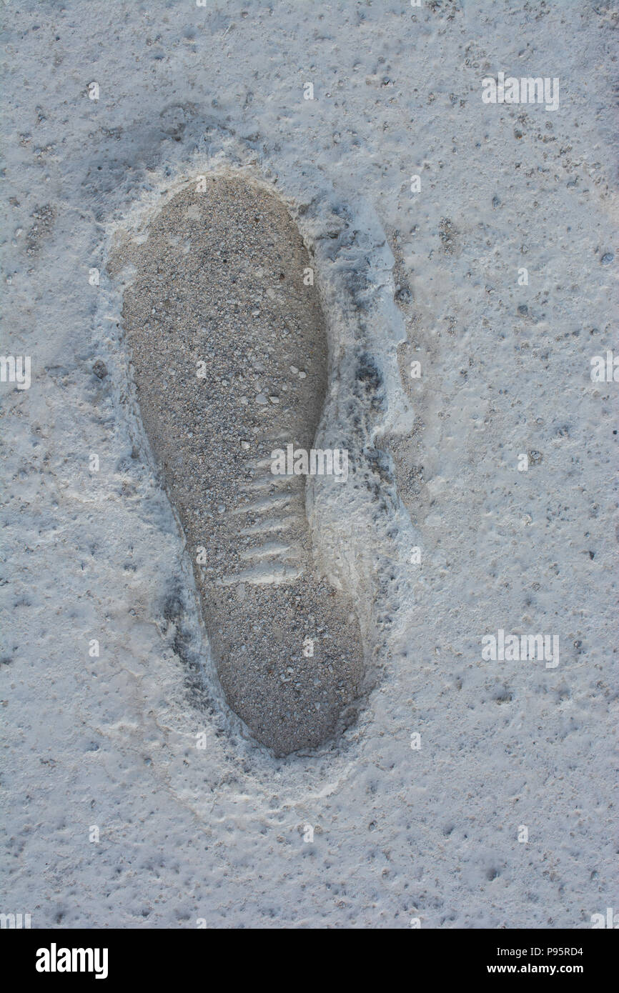 Footstep pattern seen on a concrete background Stock Photo - Alamy