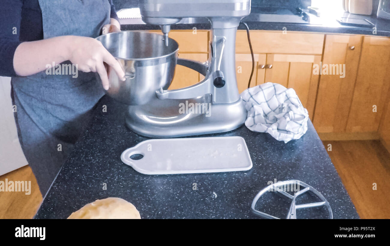 Step by step. Woman baking sugar cookies in residential kitchen Stock ...
