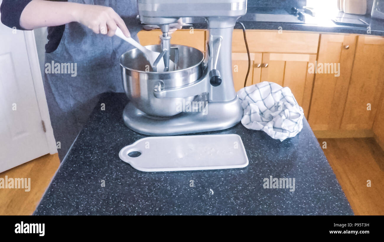 Step by step. Woman baking sugar cookies in residential kitchen Stock ...