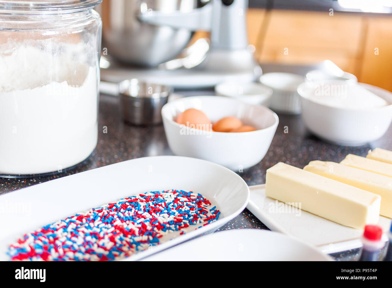 Step by step. Ingredients to bake sugar cookies on the kitchen counter ...