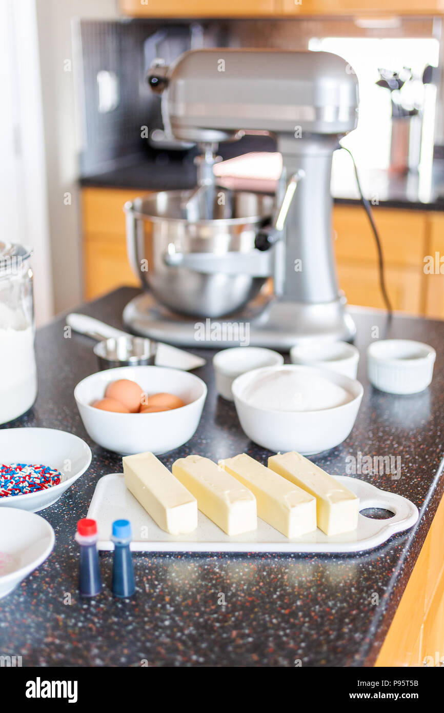 Step by step. Ingredients to bake sugar cookies on the kitchen counter ...