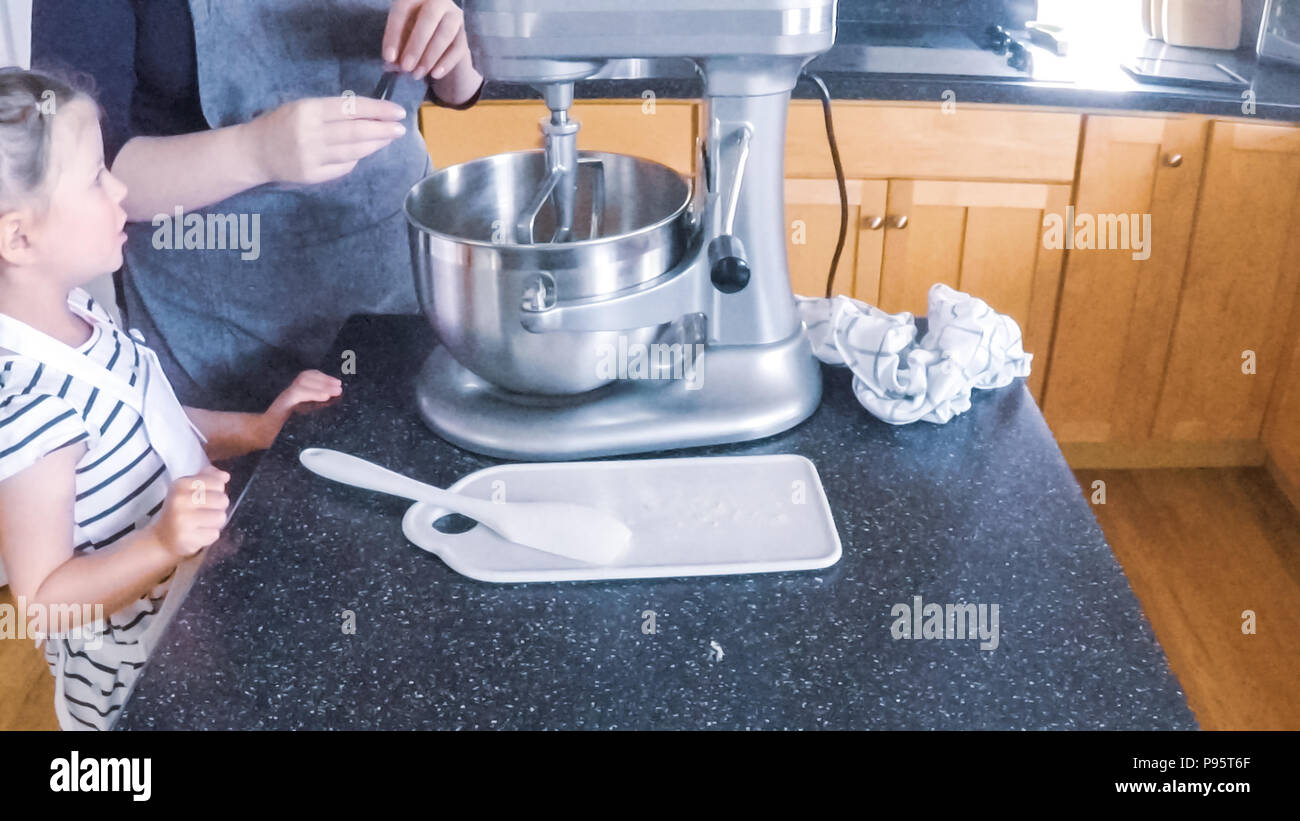 Step By Step Mother And Daughter Baking Sugar Cookies In The Kitchen