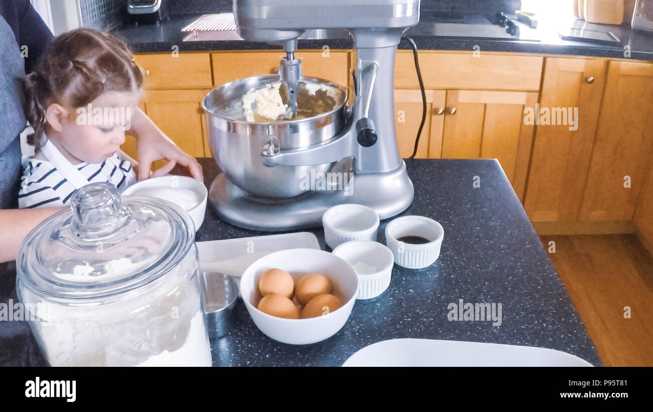 Step By Step Mother And Daughter Baking Sugar Cookies In The Kitchen