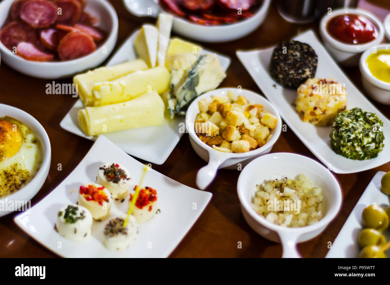 Set with different appetizers in small portions, healthy and delicious ...