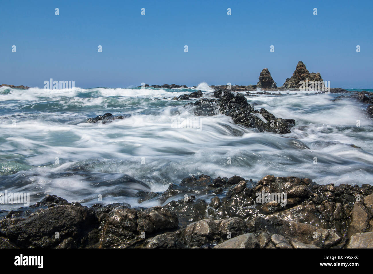 Sea rocks jagged rough hi-res stock photography and images - Alamy