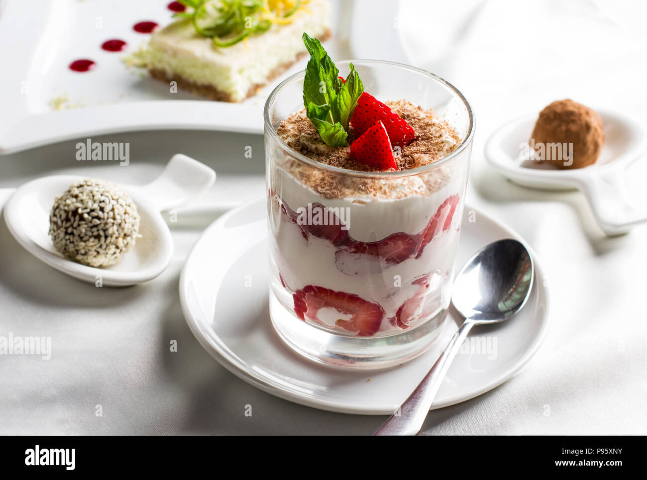 Sweet table with organic raw food desserts, sweets, yogurt with ...