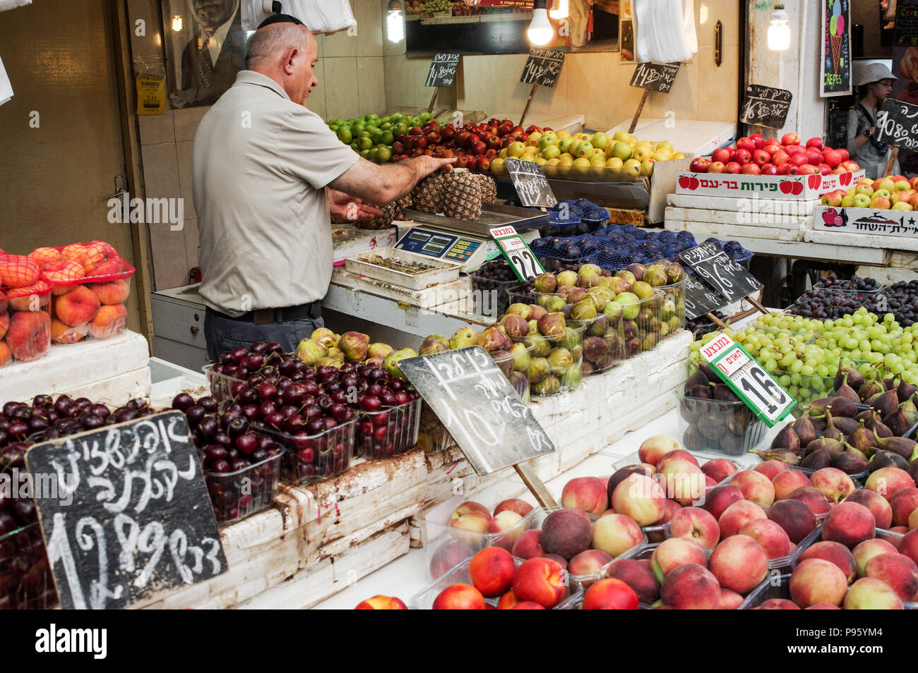 Jewish fruit seller at the Mahane Yehuda market in Jerusalem, Israel ...