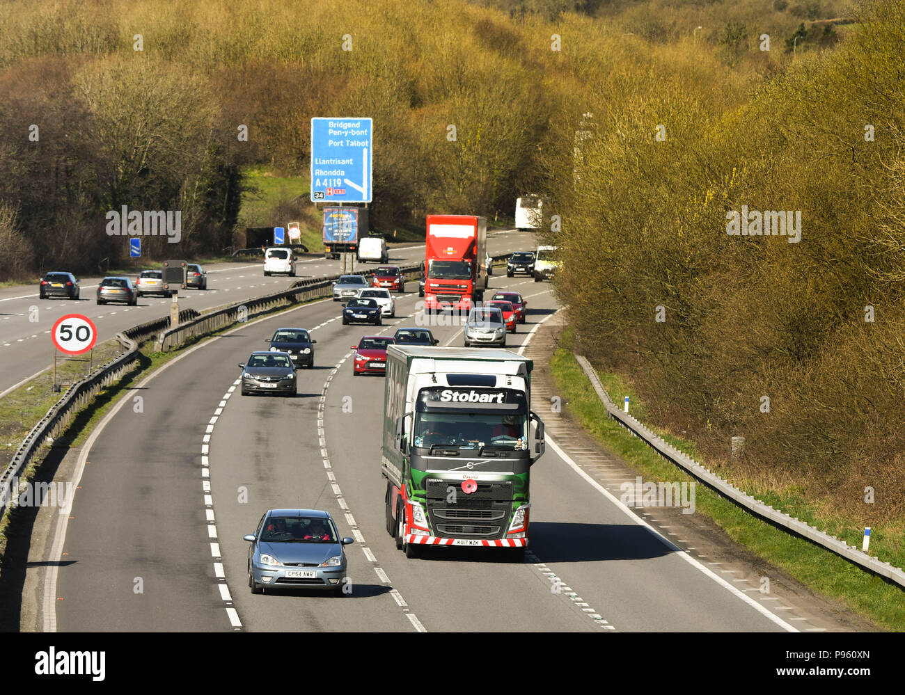 Traffic on the M4 motorway a near Junction 34 at Miskin on the ...