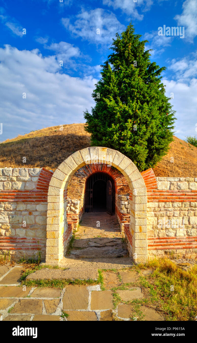 Entrance and stone wall of ancient sanctuary Stock Photo - Alamy