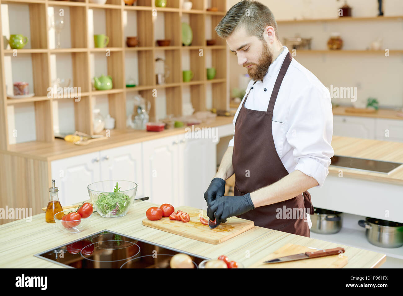 Professional chef at work hi-res stock photography and images - Alamy