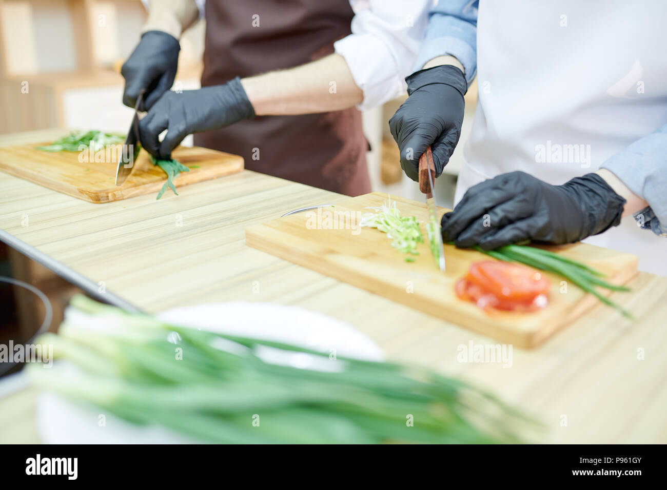 Two Chefs Cooking in Restaurant Stock Photo - Alamy