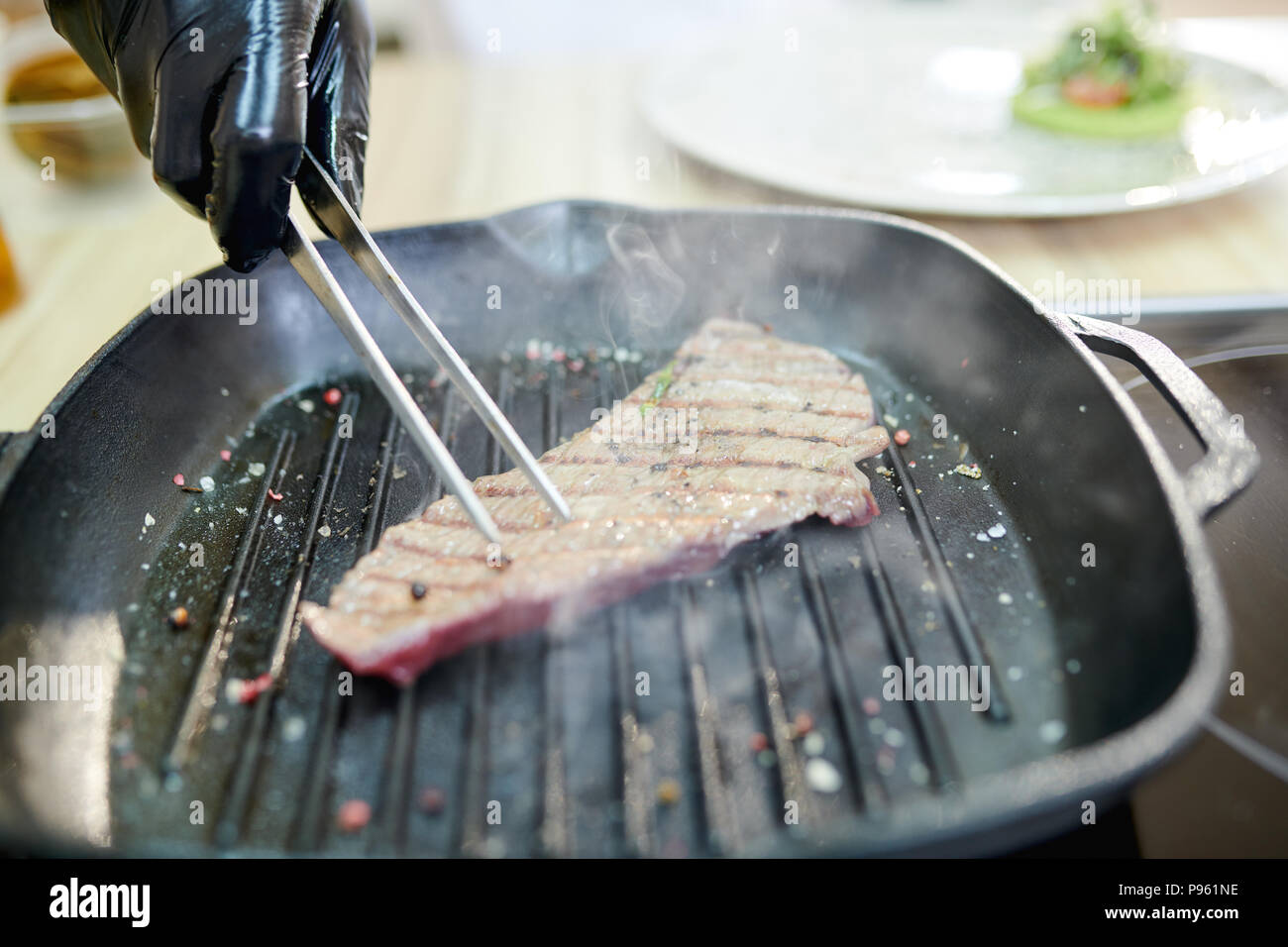 Grilling Meat in Restaurant Stock Photo - Alamy