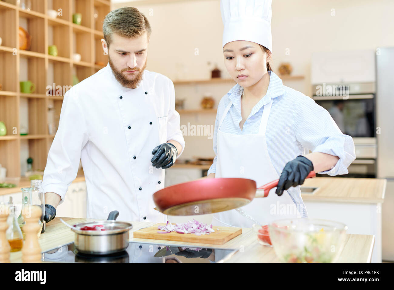 In His Kitchen With His Assistant Chefs High Resolution Stock ...