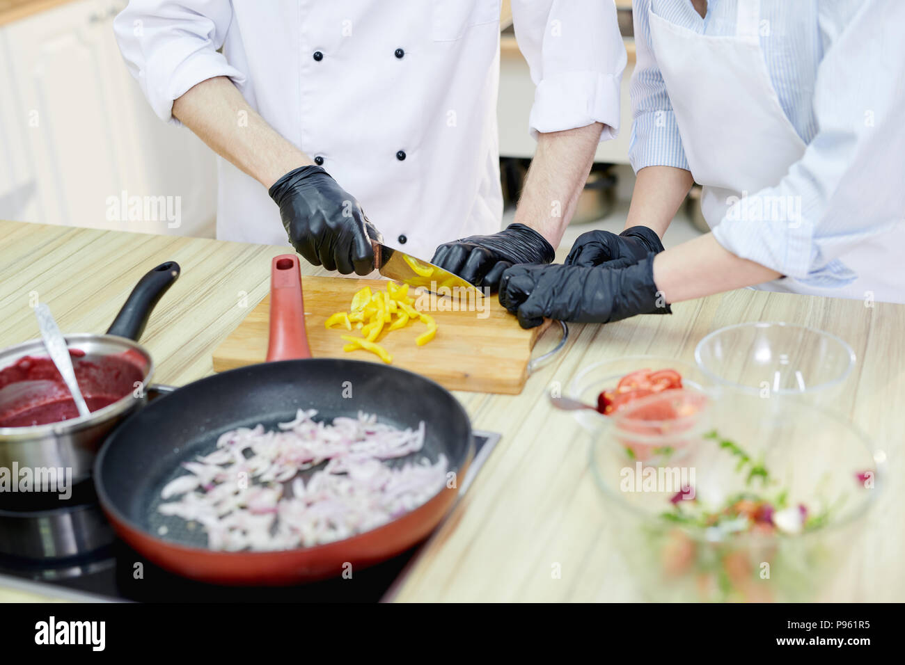 Professional chefs hands cooking hi-res stock photography and images ...
