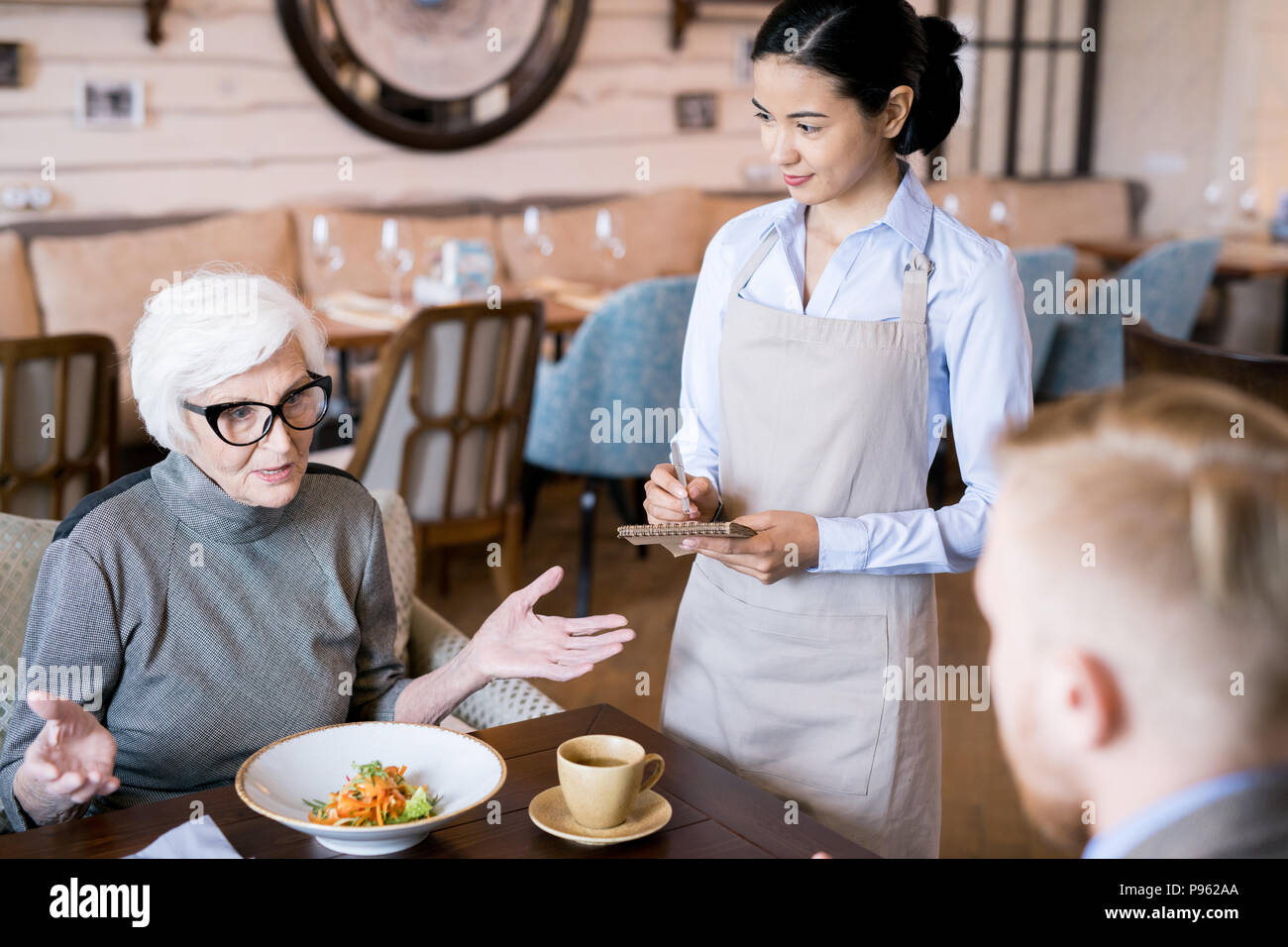 Family dinner at the restaurant Stock Photo - Alamy
