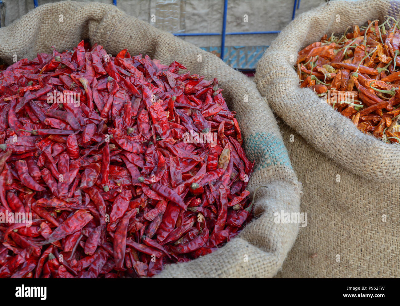 Selling dried chilli peppers at rural market in Srinagar, India Stock ...