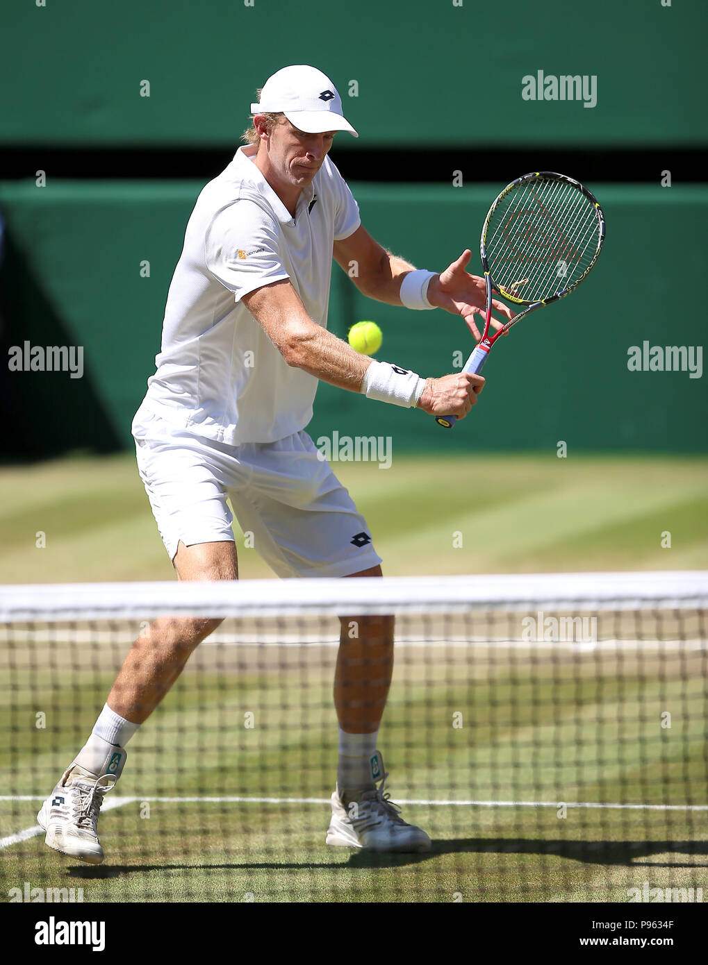 Kevin Anderson in action on day thirteen of the Wimbledon Championships ...