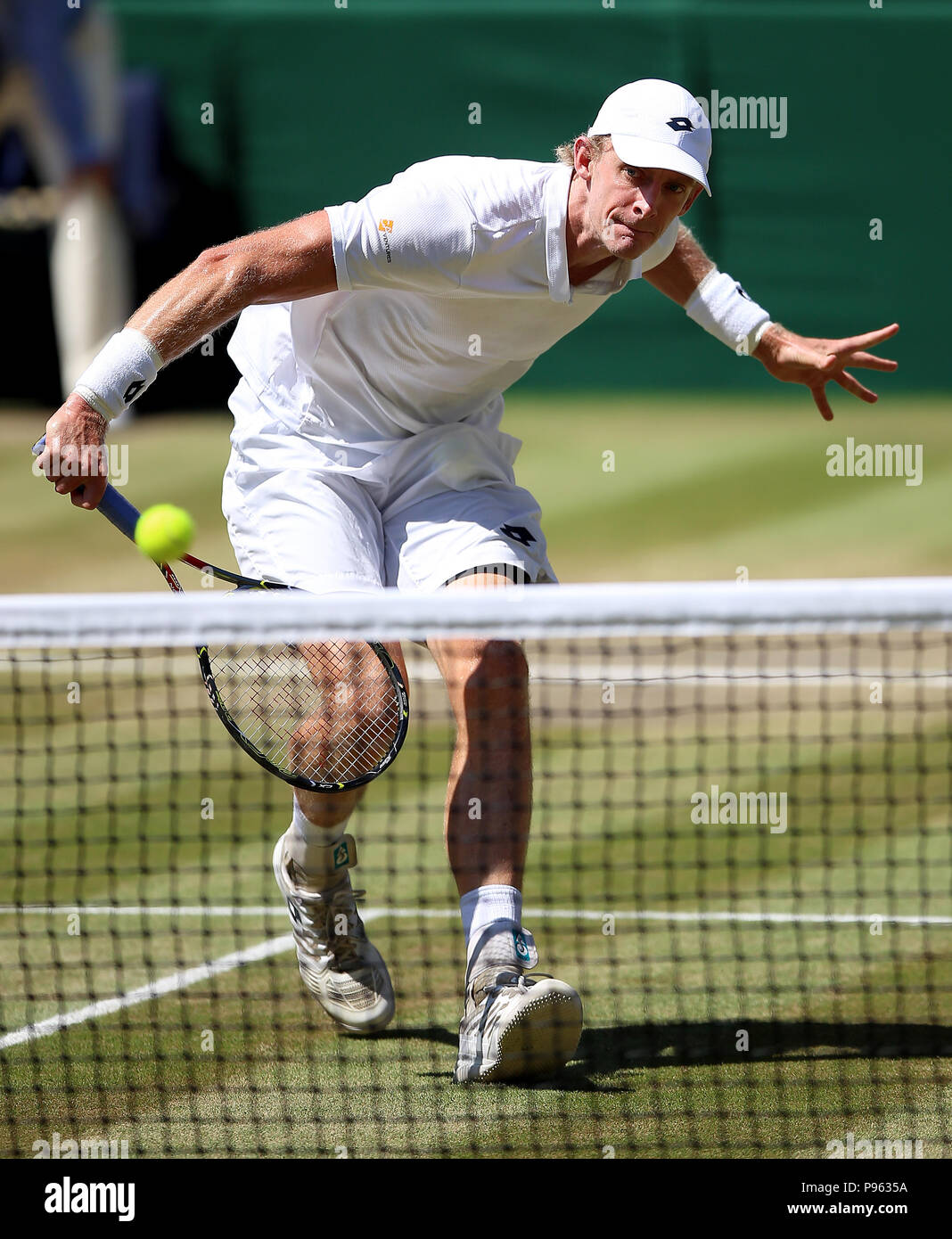 Kevin Anderson in action on day thirteen of the Wimbledon Championships ...