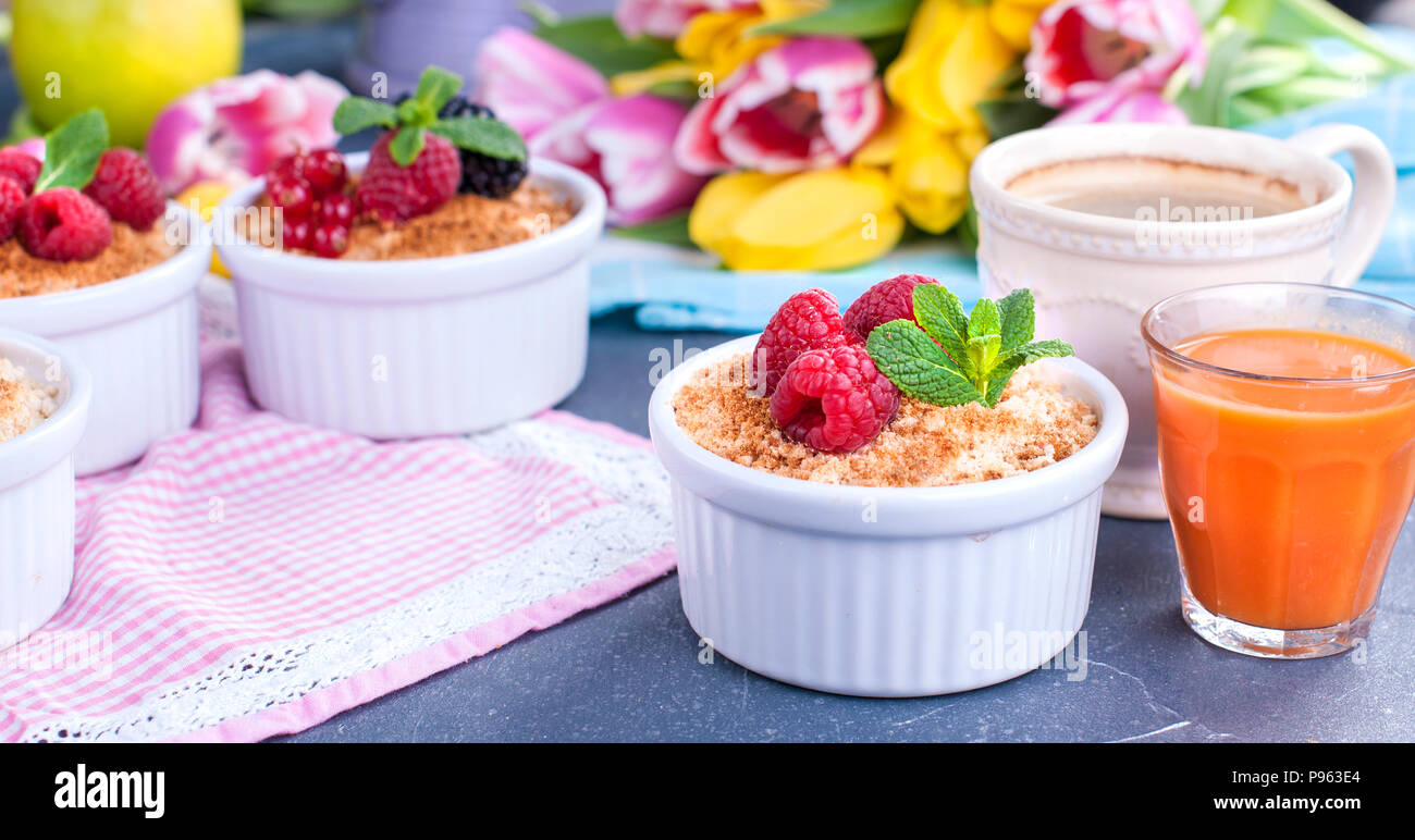 Sweet breakfast in portions with raspberries and mint. Homemade ...