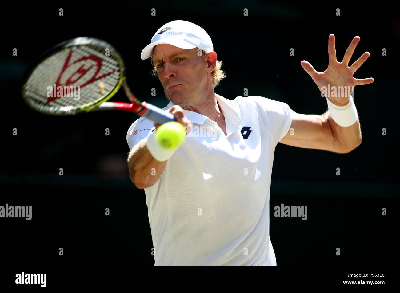 Kevin Anderson in action on day thirteen of the Wimbledon Championships ...