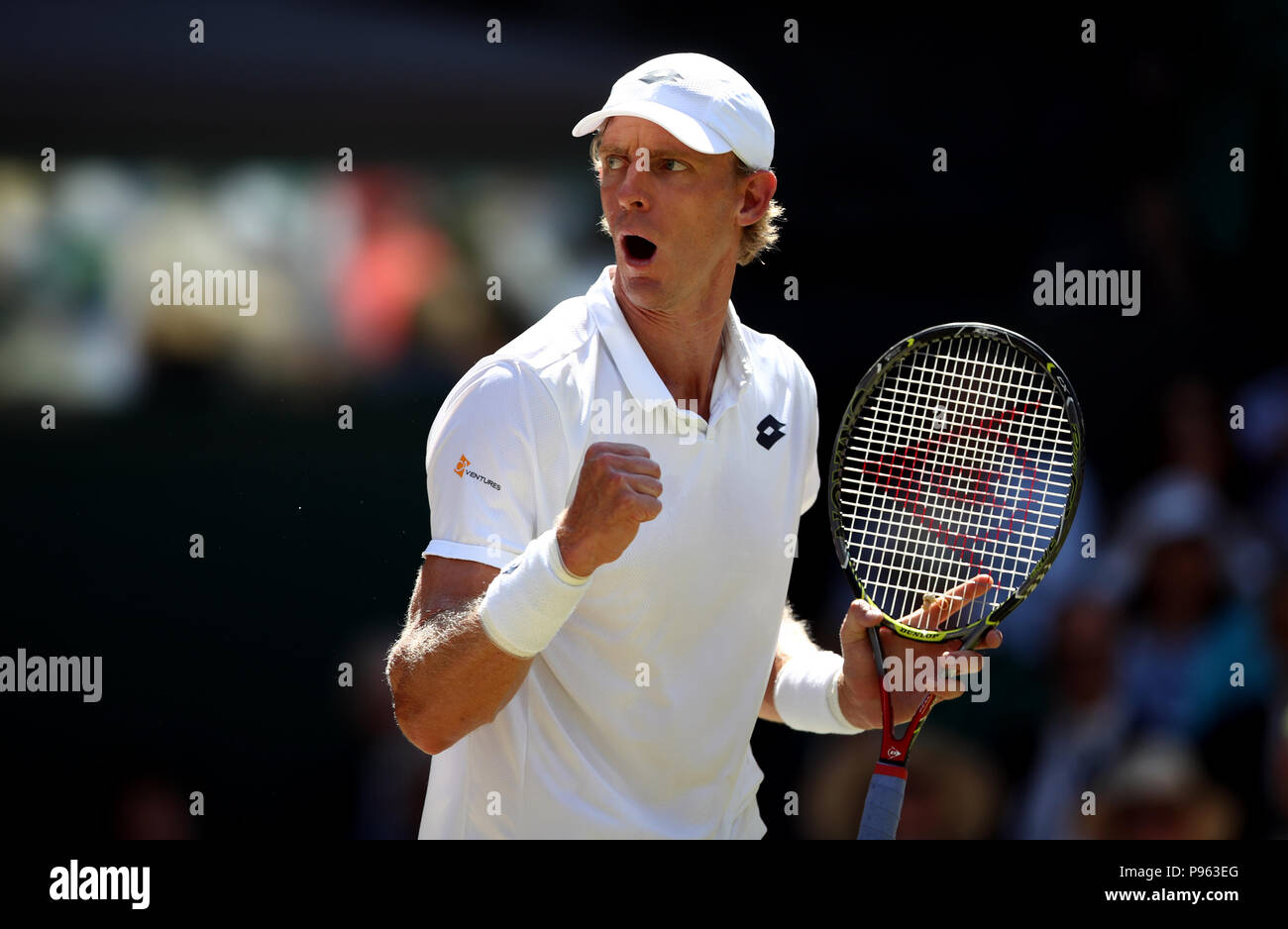Kevin Anderson in action on day thirteen of the Wimbledon Championships ...