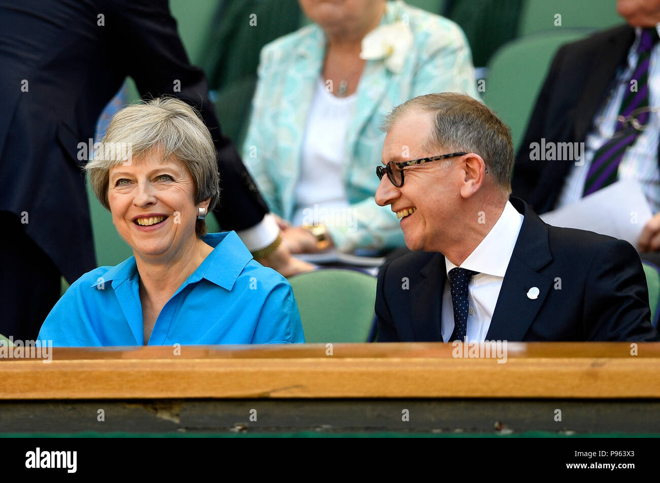 Theresa and Philip May in the royal box on centre court on day thirteen ...