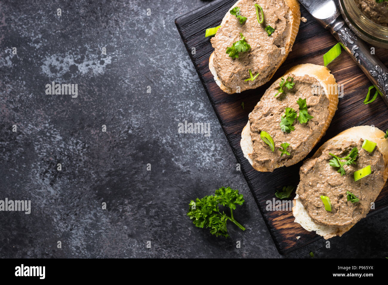 Pate from beef liver. Sandwiches with bread, pate and greens, dark ...