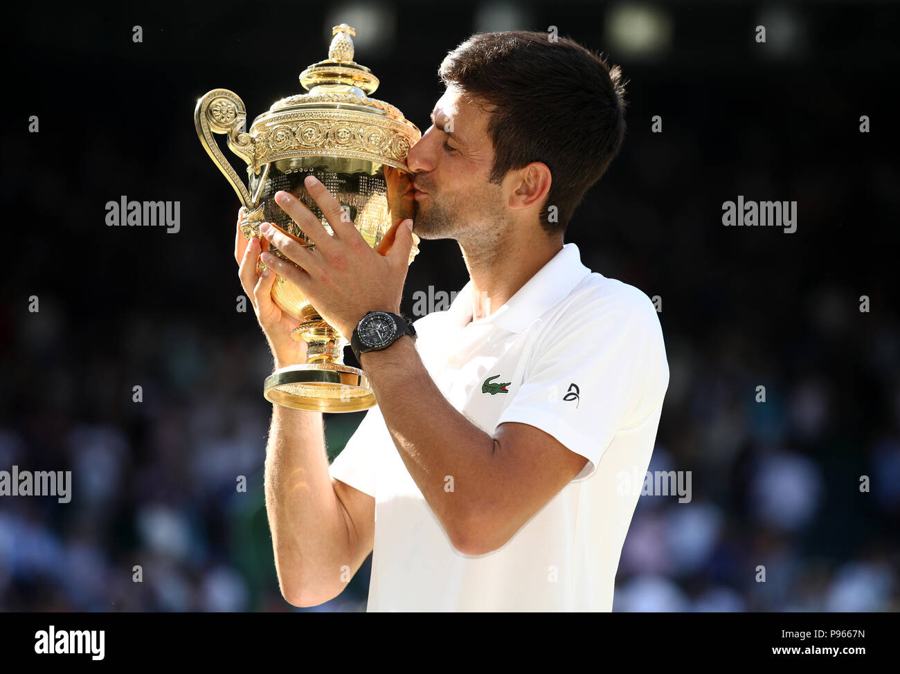 Novak Djokovic with the trophy after winning the Gentlemen's singles ...