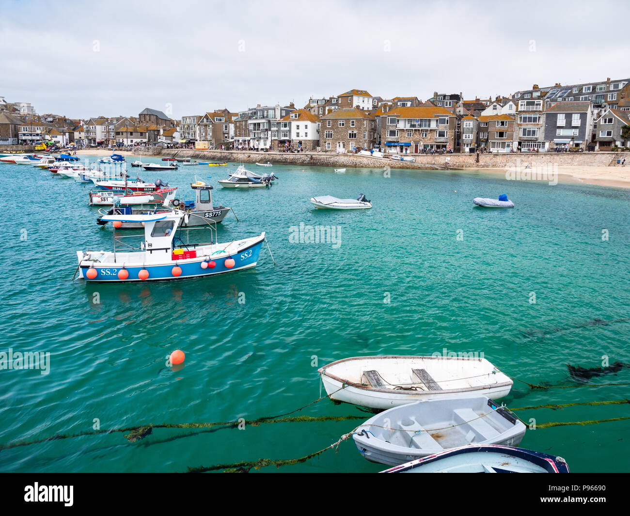 ST IVES, ENGLAND - JUNE 19: The sea looking a beautiful blue/green in ...