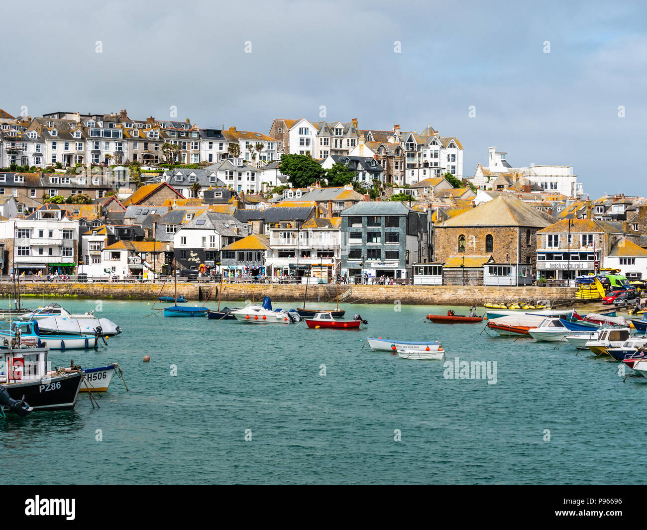ST IVES, ENGLAND - JUNE 19: Lots of tourists visiting beautiful St Ives ...