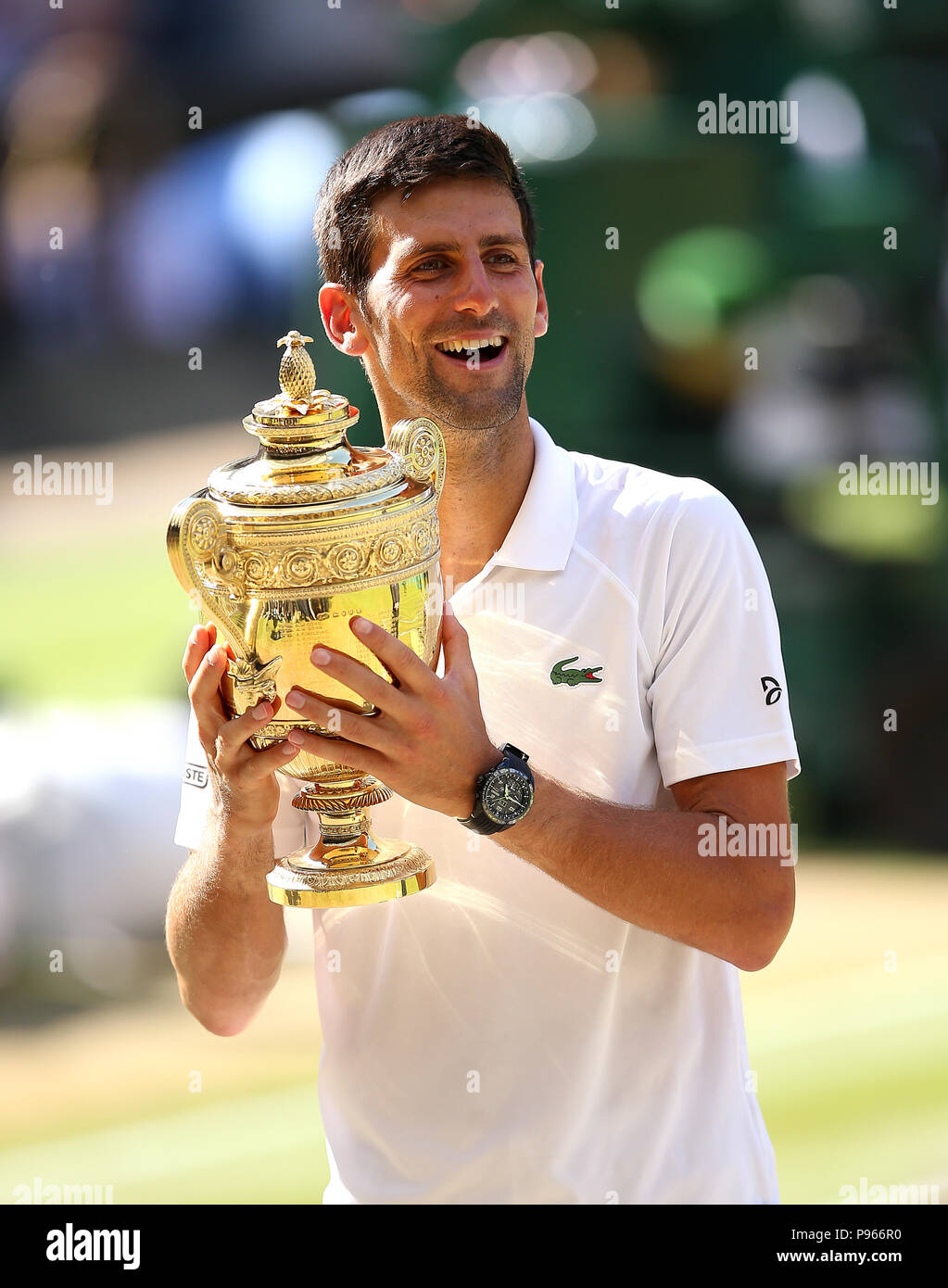 Novak Djokovic with the trophy after winning the Gentlemen's Singles ...