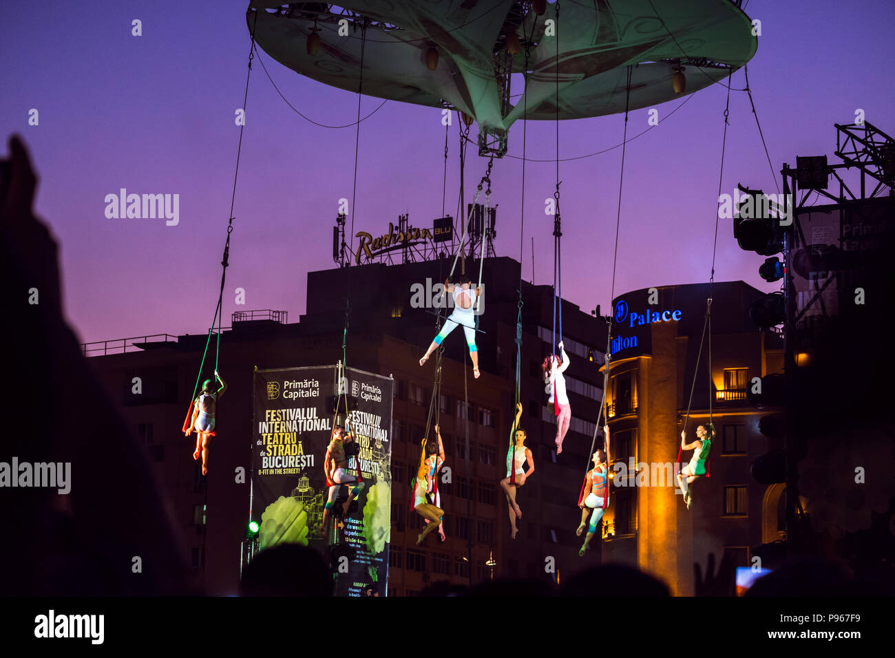 Circus performer woman hanging hi-res stock photography and images - Alamy