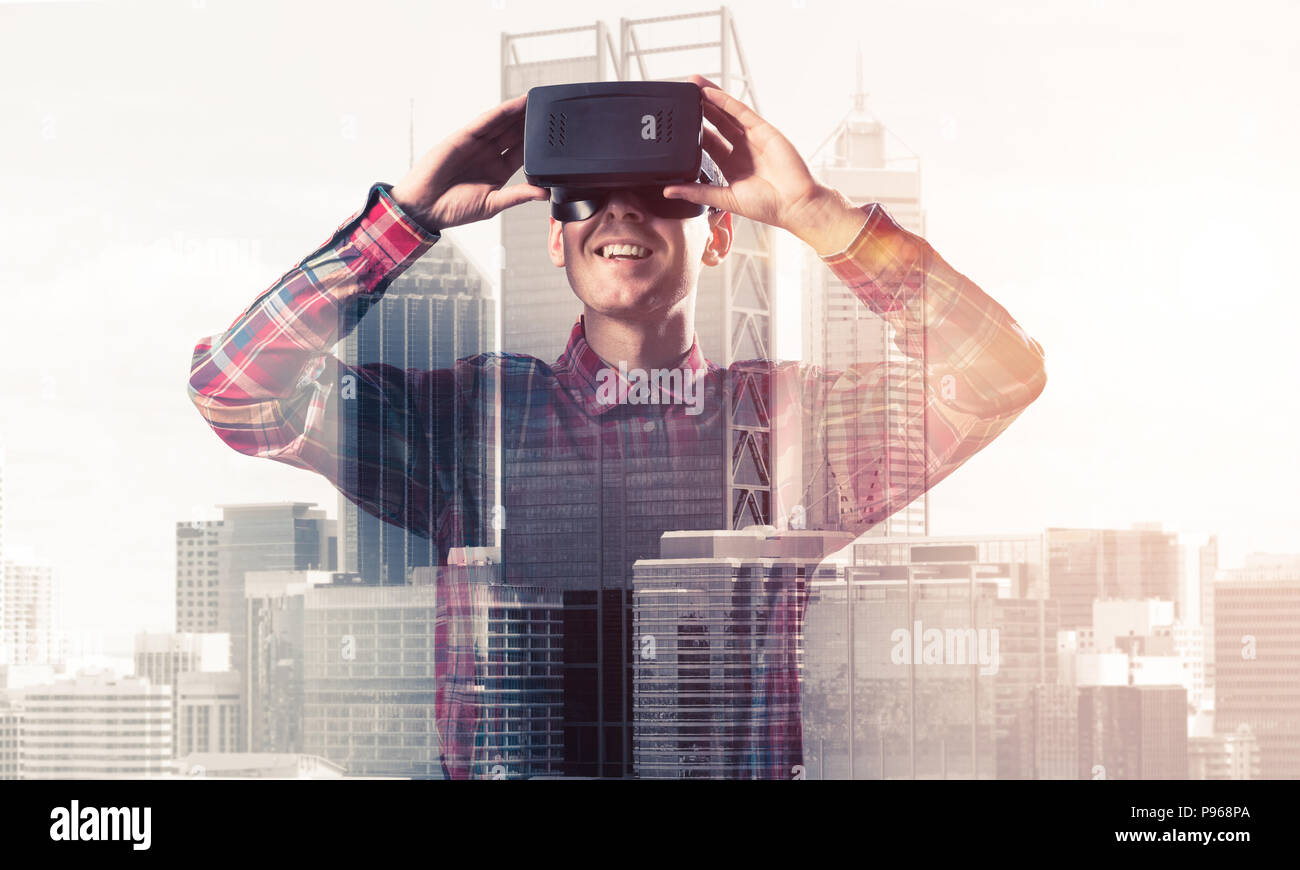 Guy wearing checked shirt and virtual mask demonstrating some em Stock ...