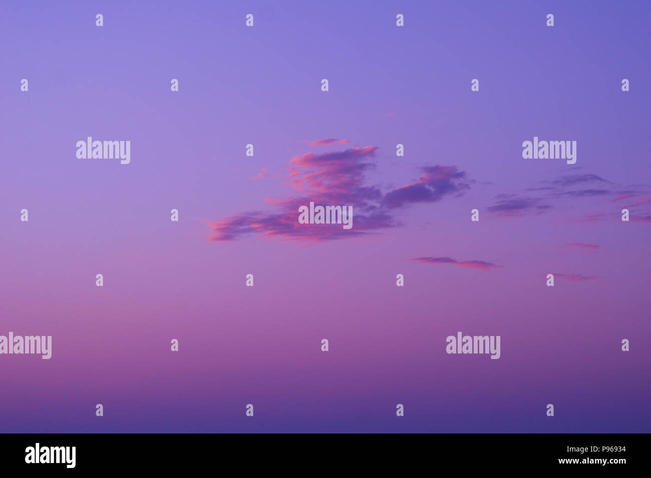 Pink cloud in sunset sky outside Weipa, Western Australia, Australia ...